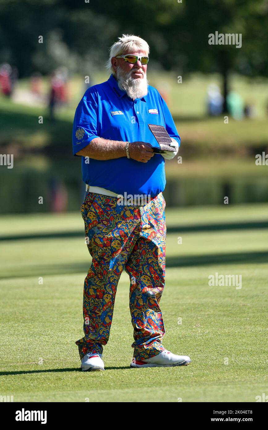 September 09, 2022: John Daly checks his notes on the 5th fairway ...