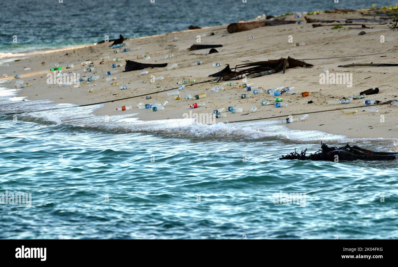 Plastic bottles thrown onto the beach by ocean currents. Borneo ...