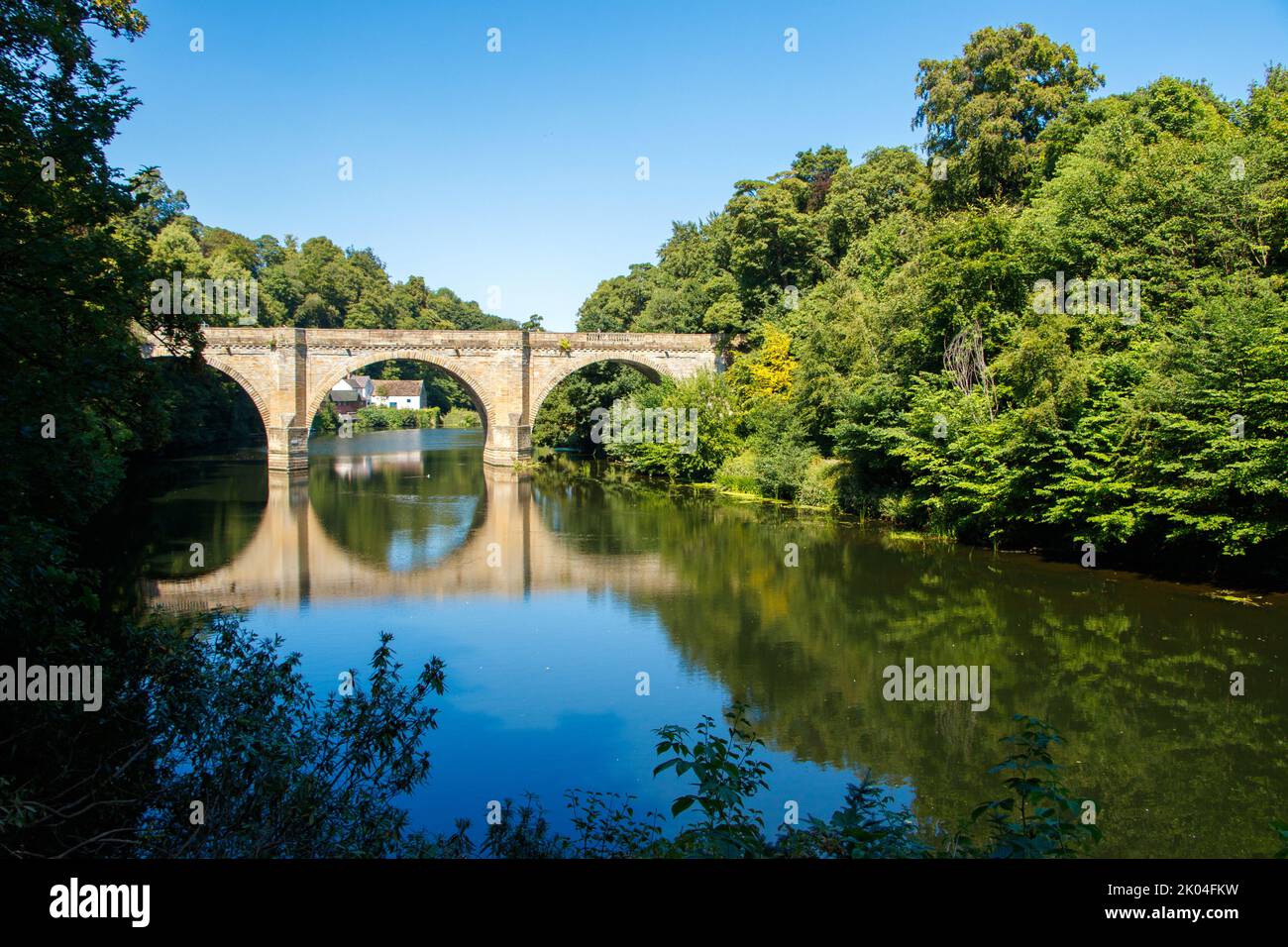 prebends bridge with arches and reflection across river in Durham Co ...