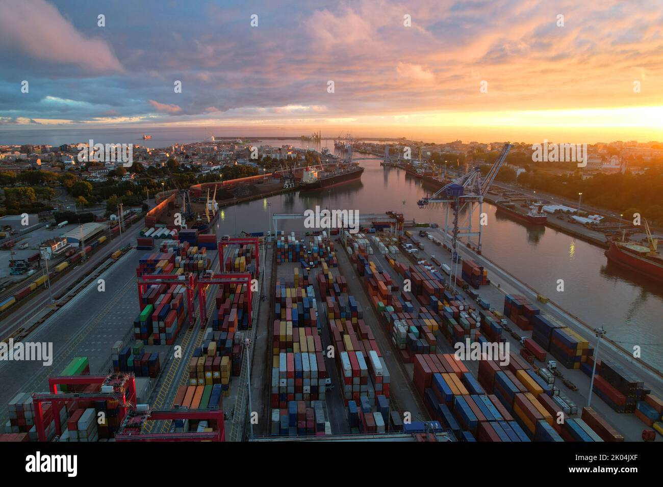 cargo containers in the shipment area of the port Stock Photo - Alamy