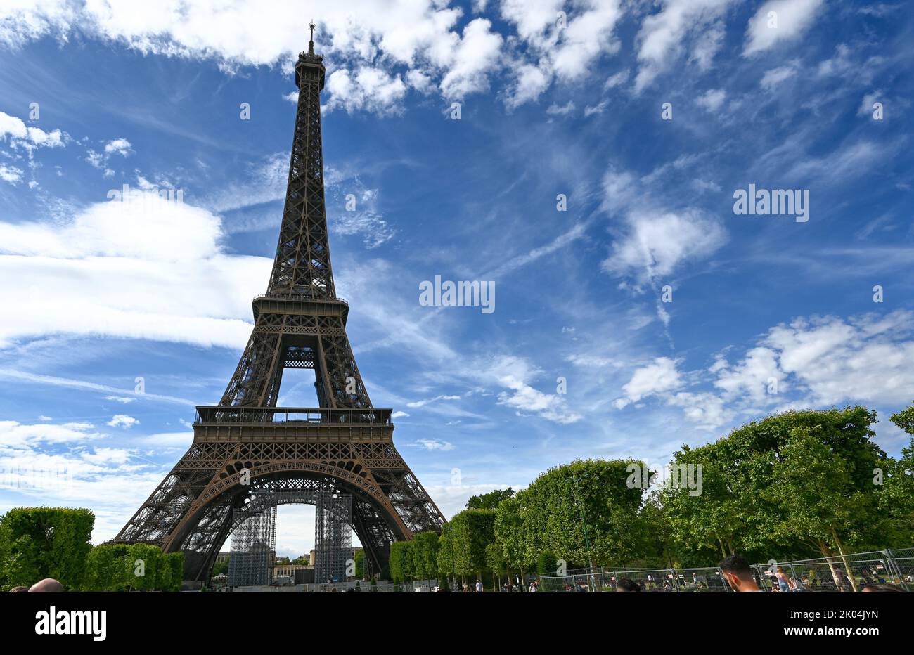 Paris, France, June 2022. In the large gardens of the Champ de Mars ...