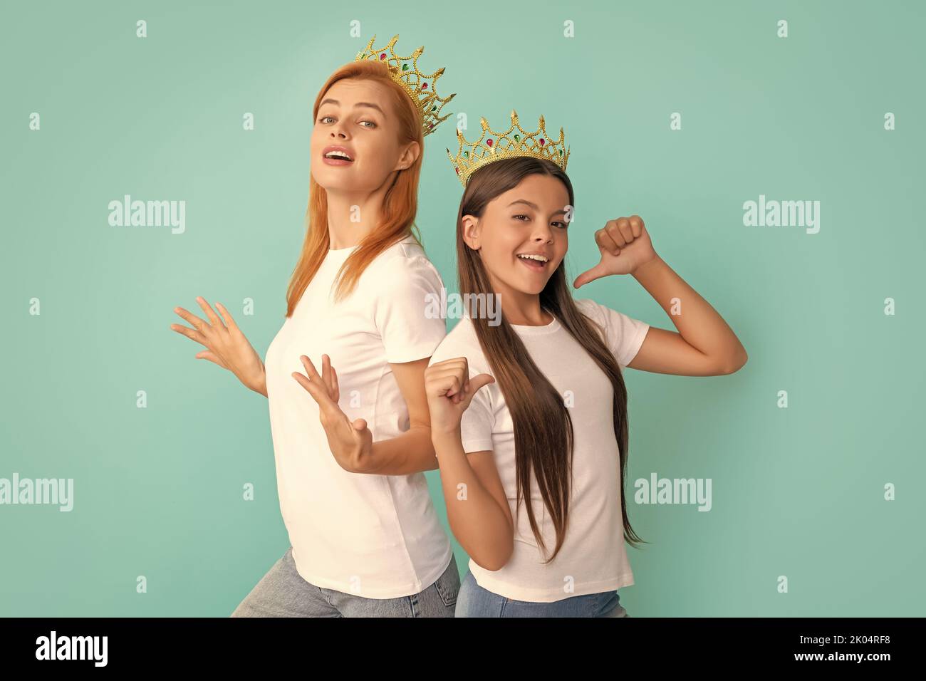 Advertising your prom. Selfish woman and girl point fingers at white ...