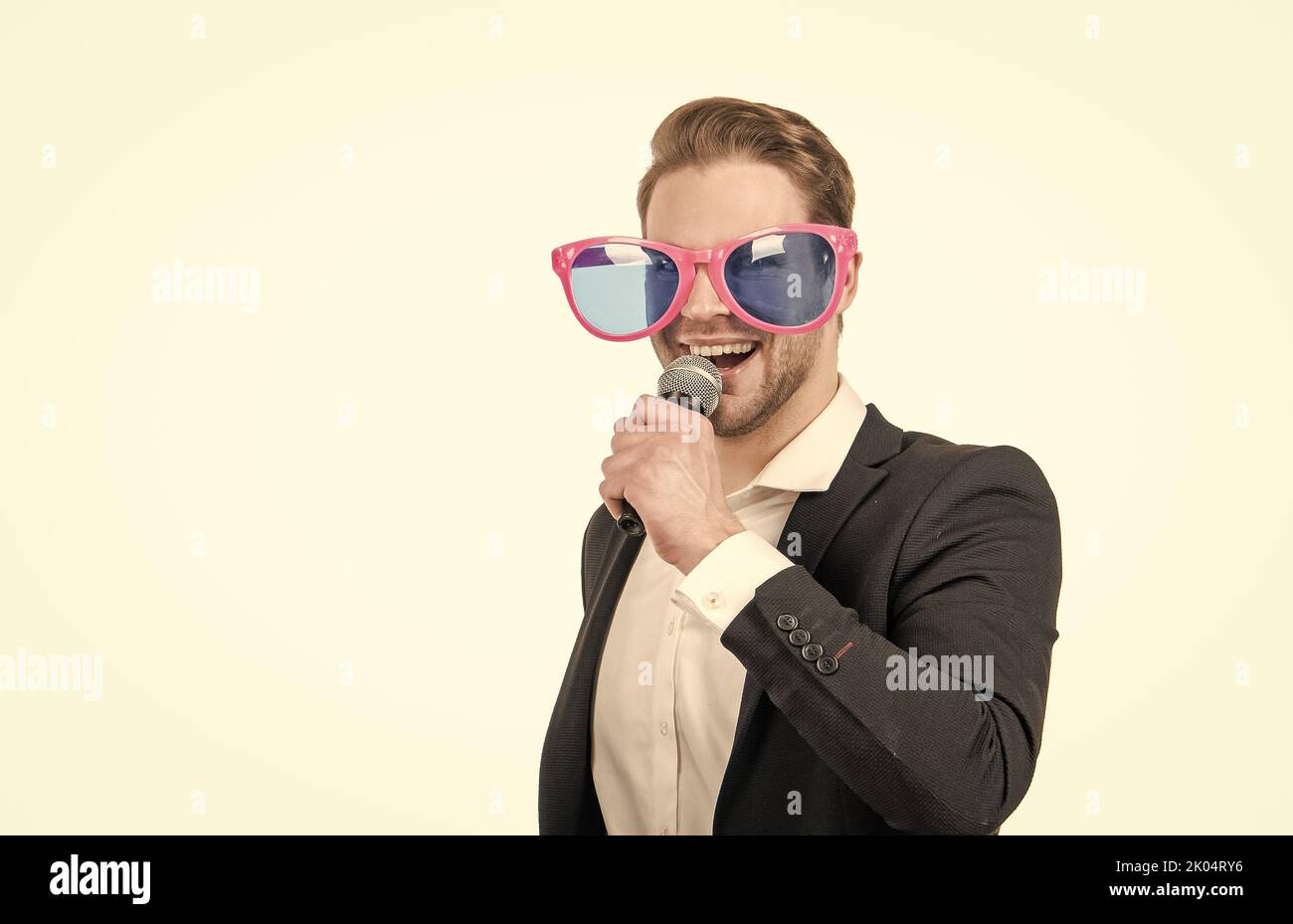 Sing as you can. Happy businessman sing song. Karaoke Stock Photo - Alamy