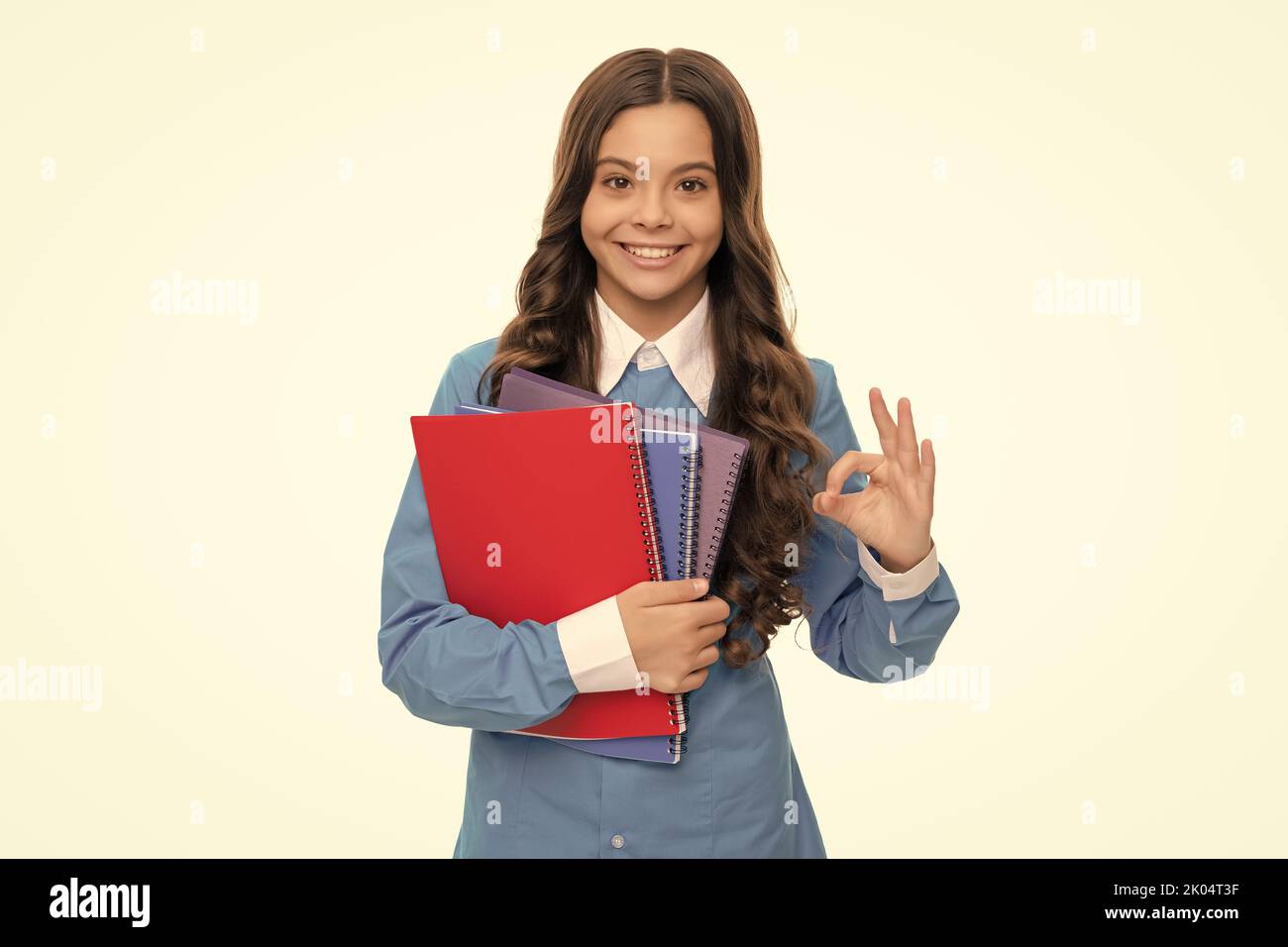 ok. happy teen girl with notebook. back to school. child ready to study ...
