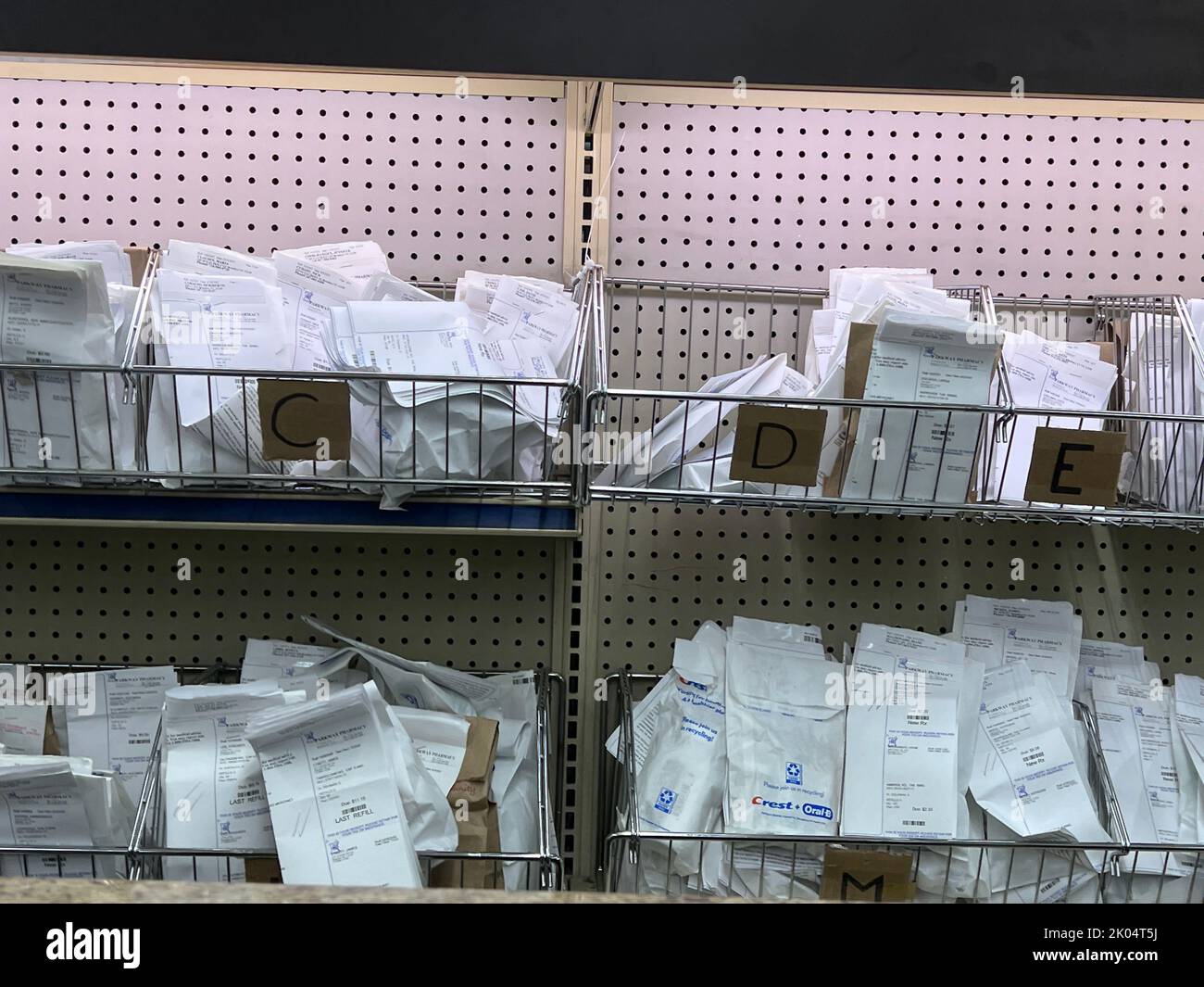 Many envelopes of prescription drugs ready to be picked up at a ...