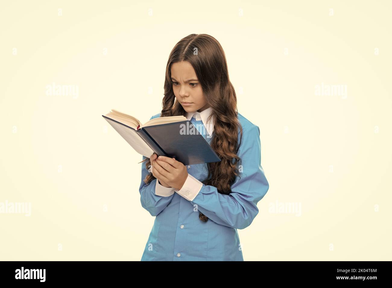 Learning never ends. Serious child read book. Open your future door ...