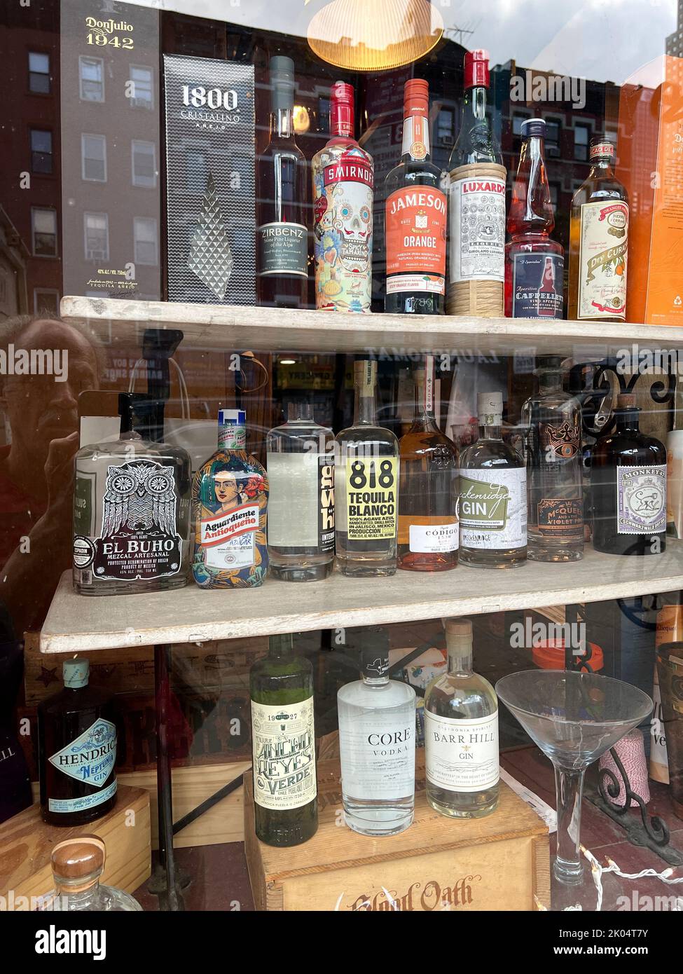 Liquor store window display in Hell's Kitchen, Manhattan, New York City ...