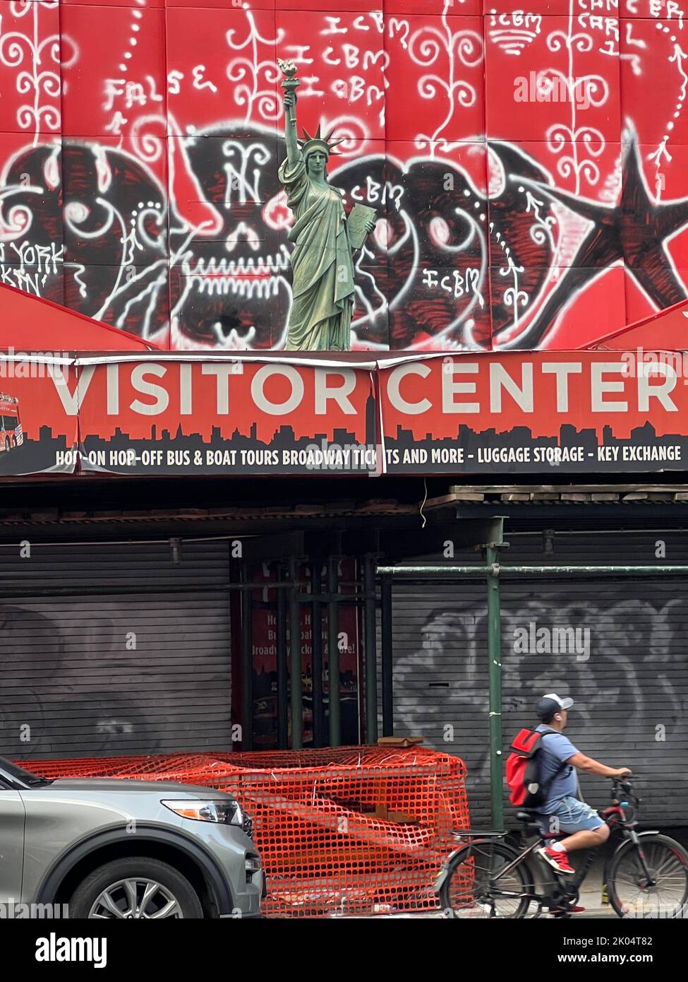 Closed entrance to a visitors center with Miss Liberty above the ...