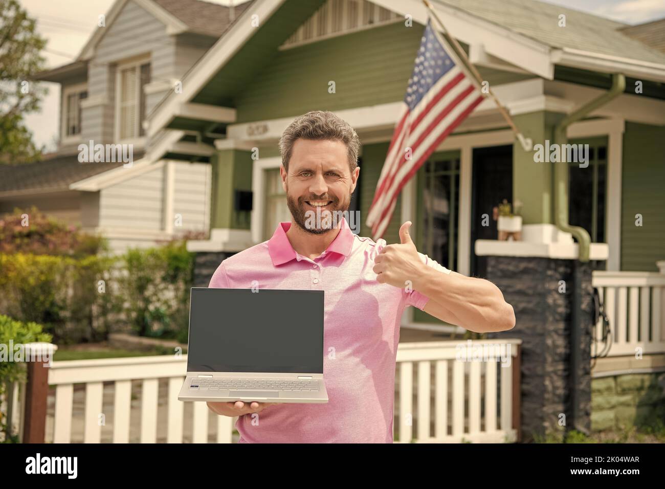 presentation of man real estate agent selling house online on computer ...