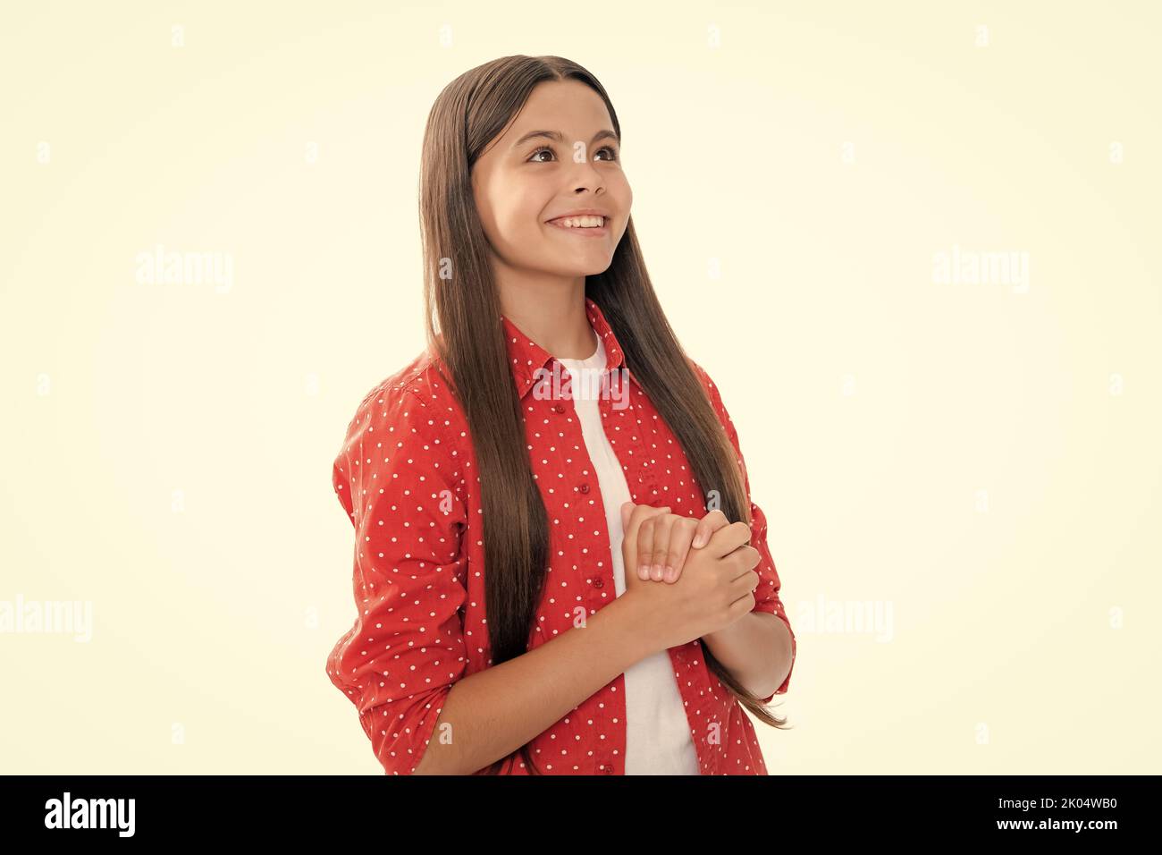 Portrait of happy smiling teenage child girl. Beautiful teen girl student. Portrait of teenager ...