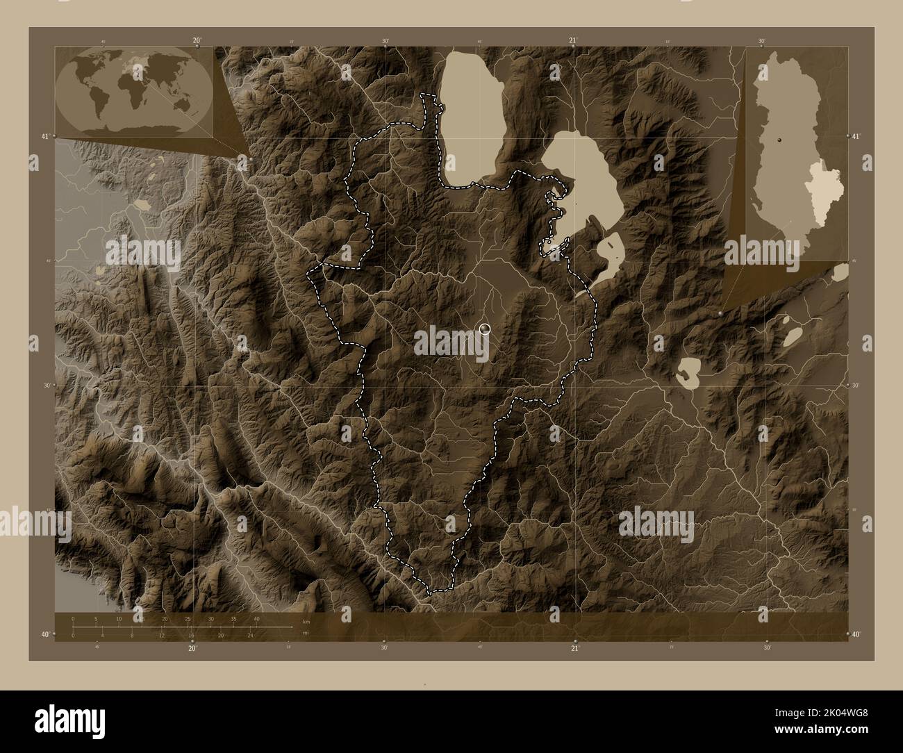Korce, county of Albania. Elevation map colored in sepia tones with ...