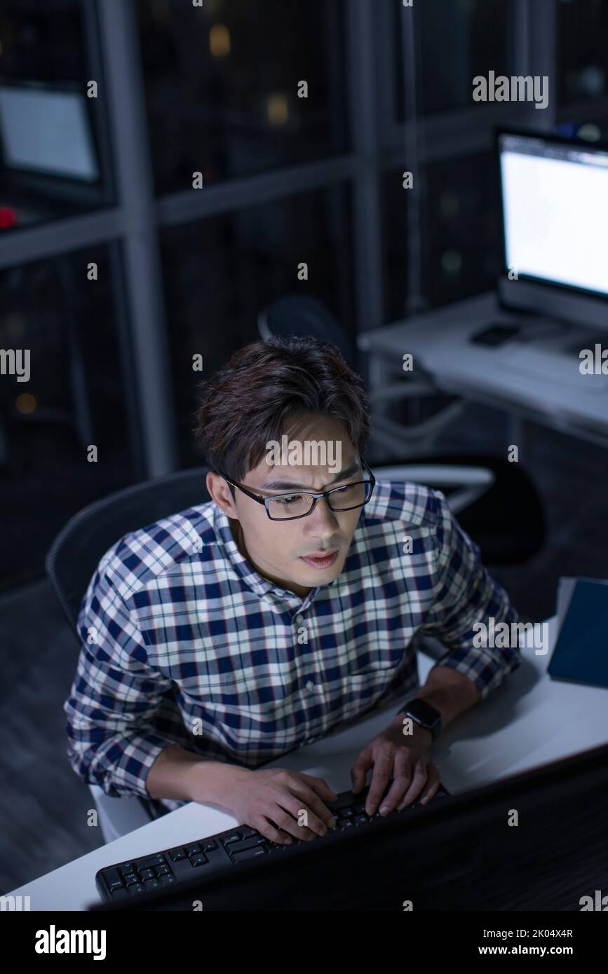 Burdened chinese man hi-res stock photography and images - Alamy