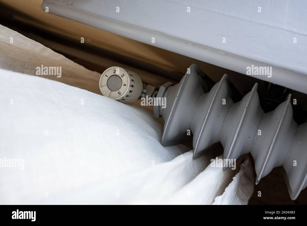 Old radiator with thermostat and the ability to reduce the heating ...