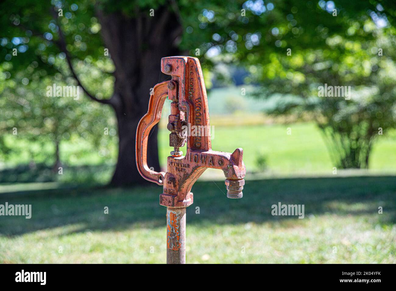 An old well pump on a farm Stock Photo - Alamy