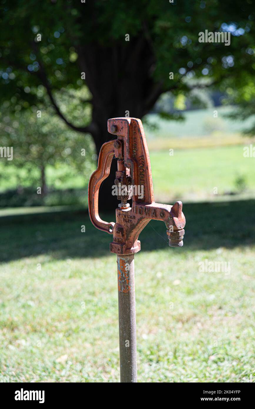 An old well pump on a farm Stock Photo - Alamy