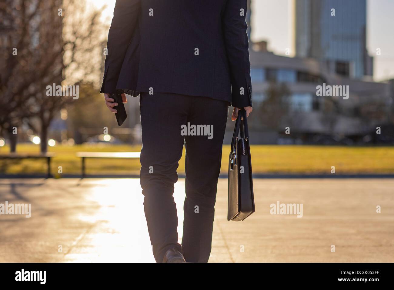 Man suit walking away back view hi-res stock photography and images - Alamy