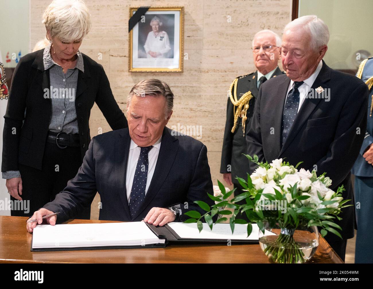Quebec Premier Francois Legault signs the condolence book dedicated to ...