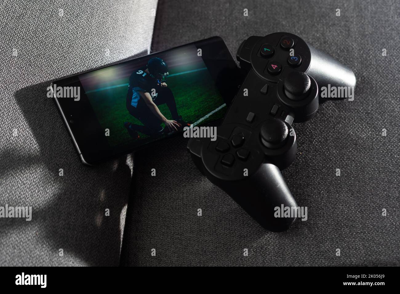 Smartphone and two game joysticks. Minimalism. Cybersport concept ...