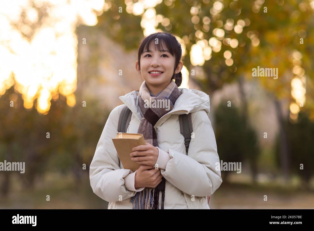 Portrait of cheerful Chinese college student Stock Photo - Alamy