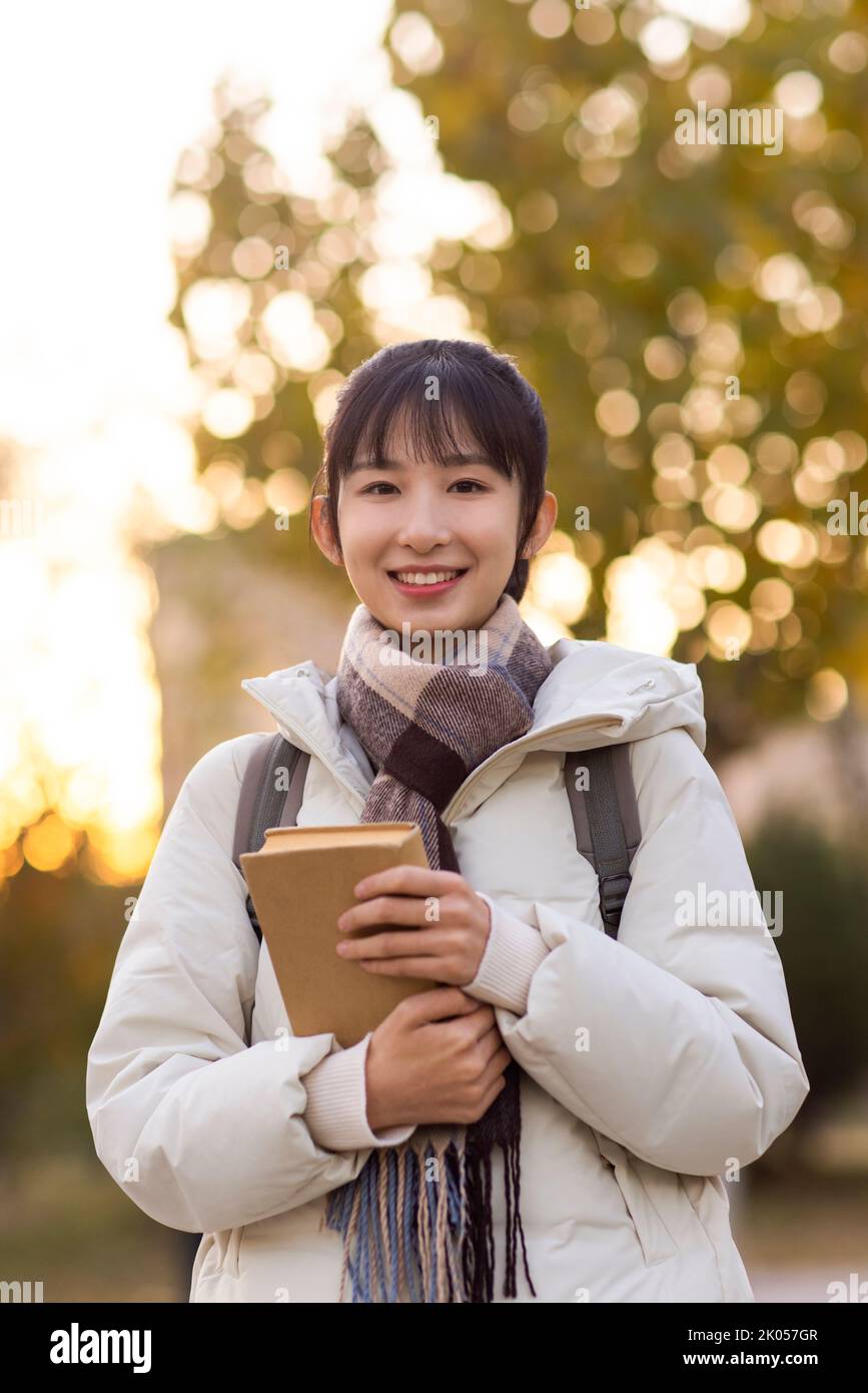 Portrait of cheerful Chinese college student Stock Photo - Alamy