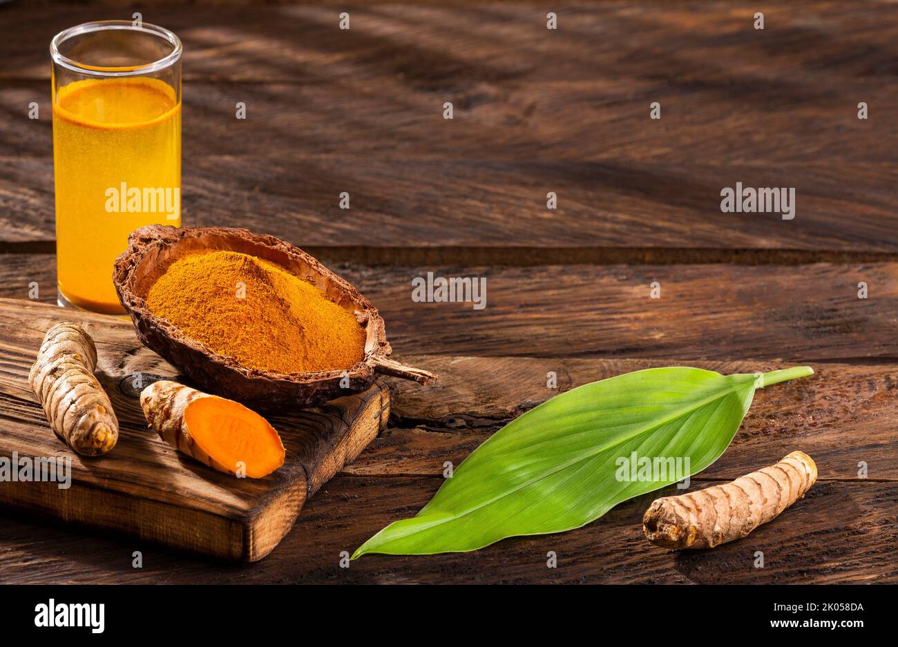 Mix of water with turmeric powder - Curcuma longa Stock Photo - Alamy