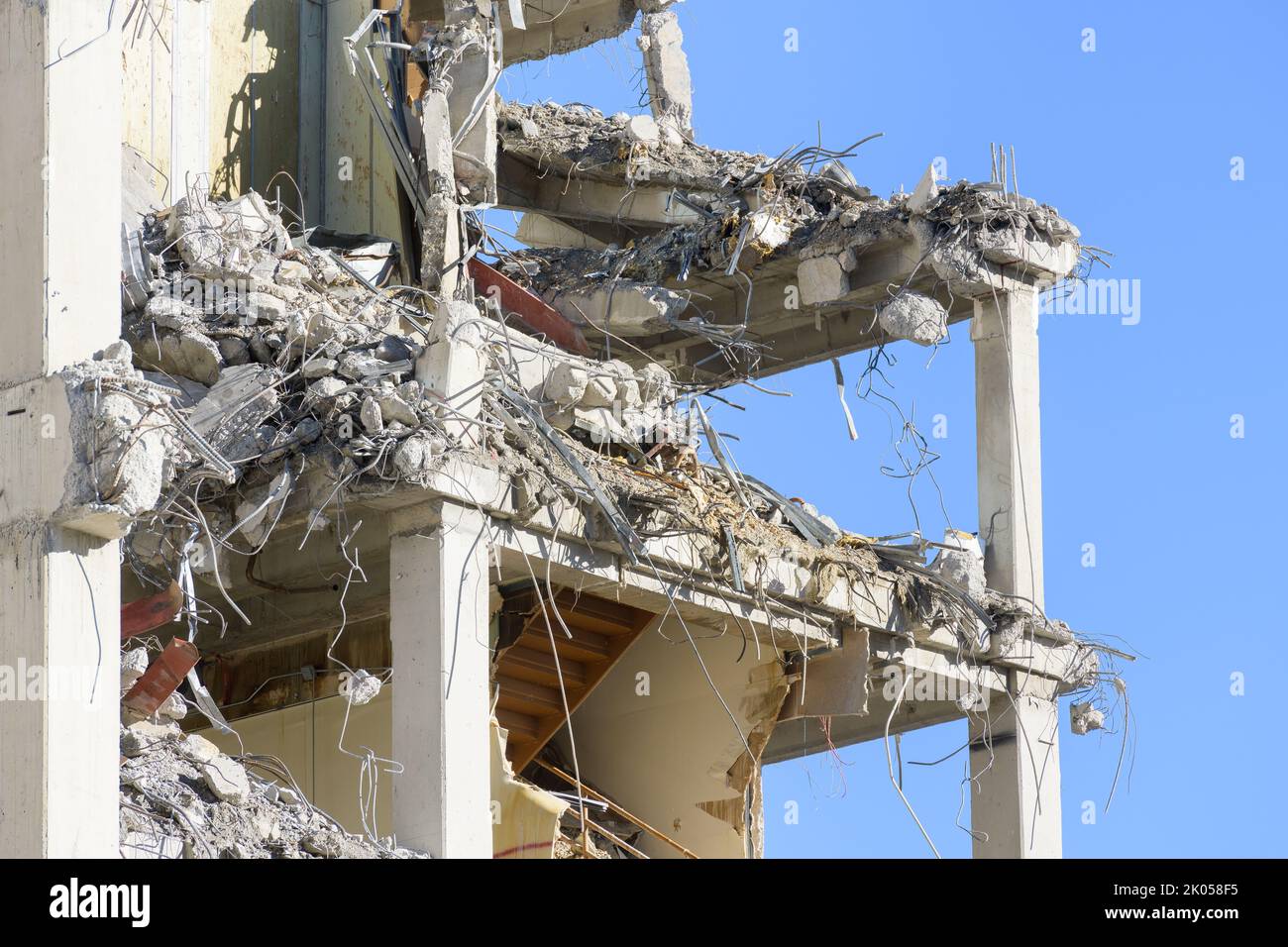 Closeup reinforced concrete building structure partially demolished ...