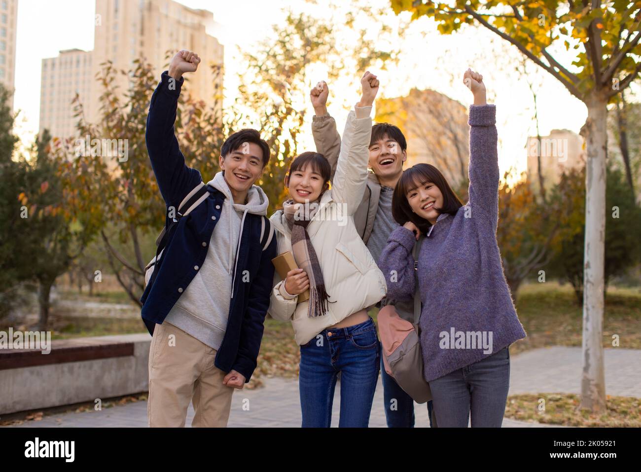 Happy Chinese college students on campus Stock Photo - Alamy