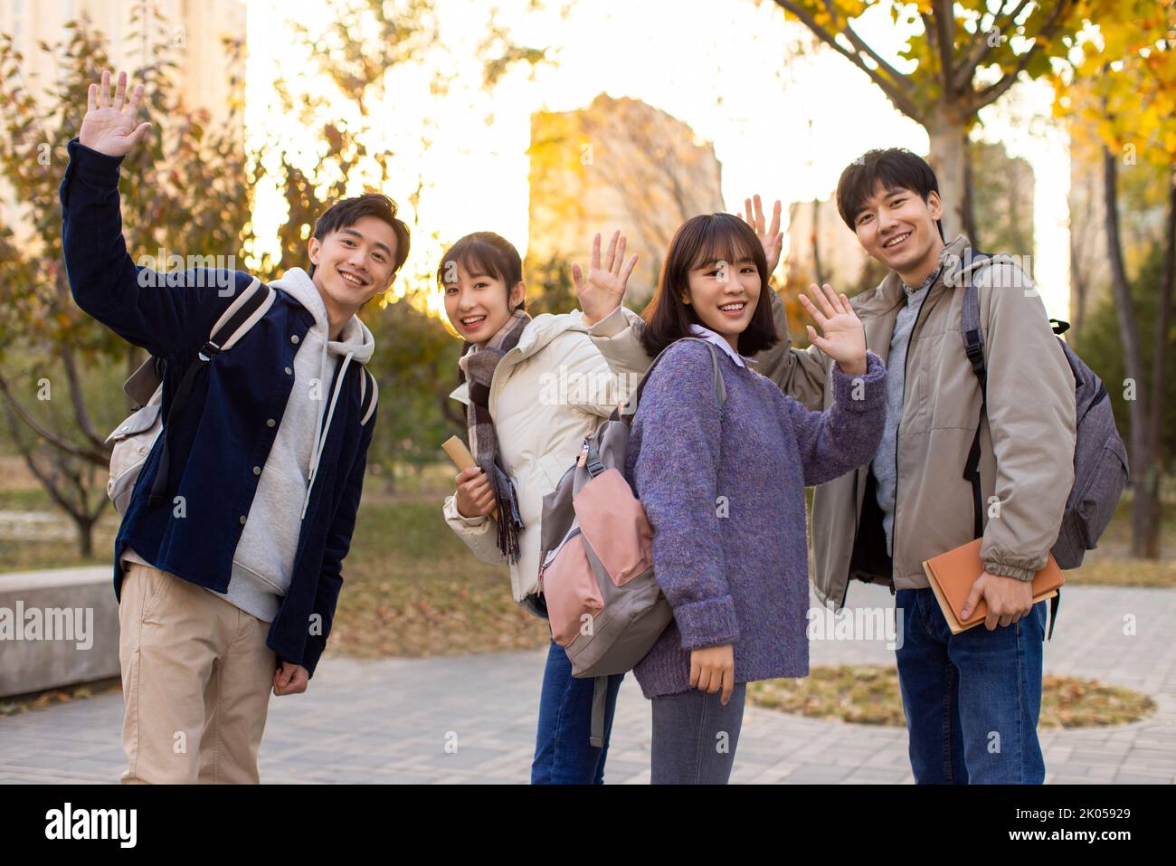 Happy Chinese college students on campus Stock Photo - Alamy