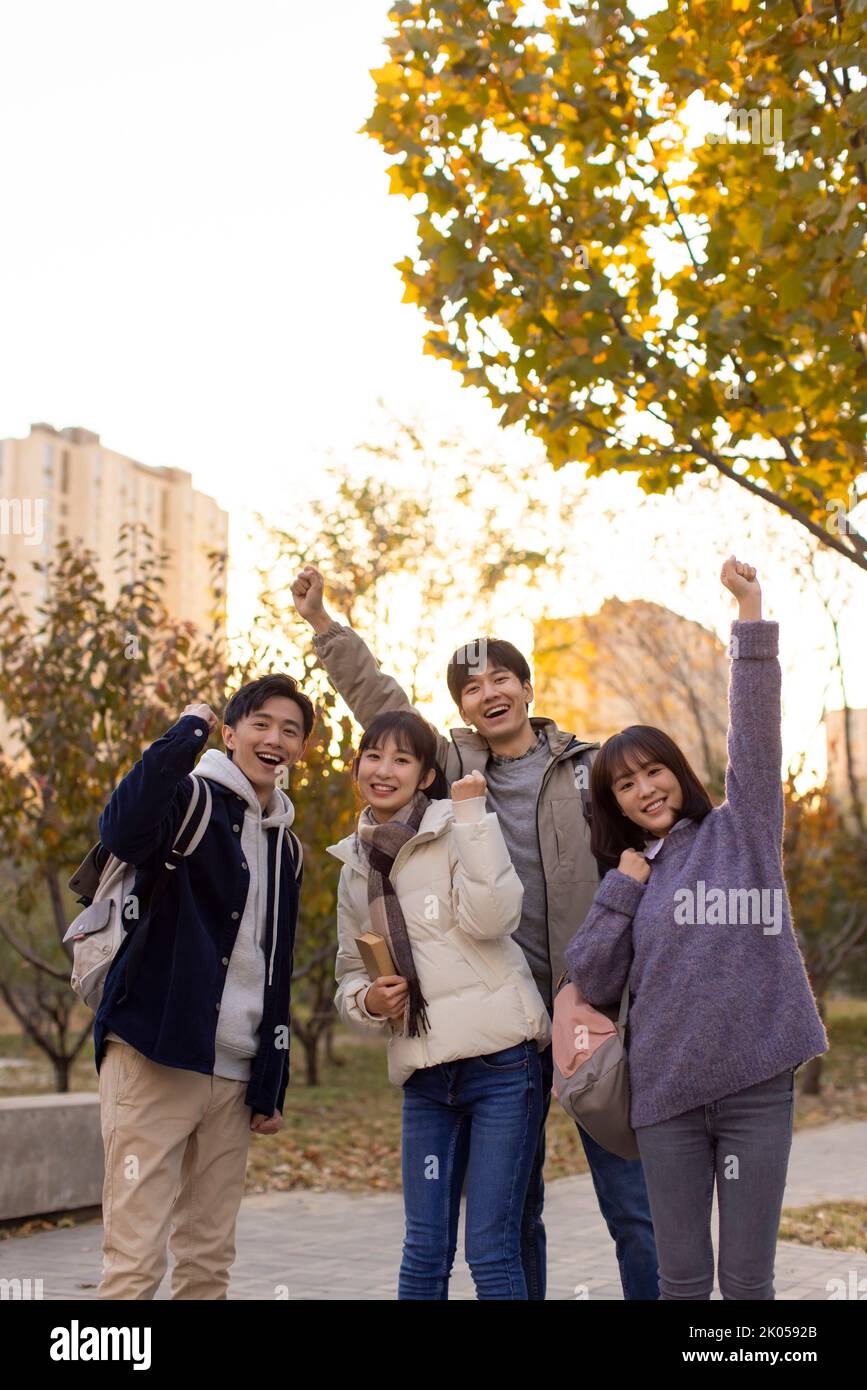 Happy Chinese college students on campus Stock Photo - Alamy