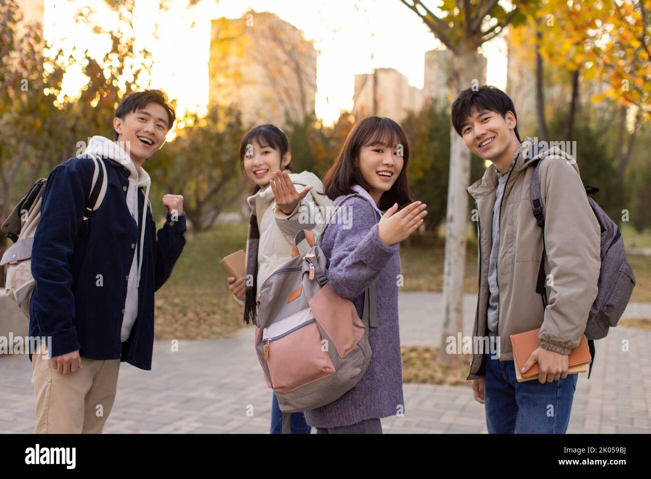 Happy Chinese college students on campus Stock Photo - Alamy