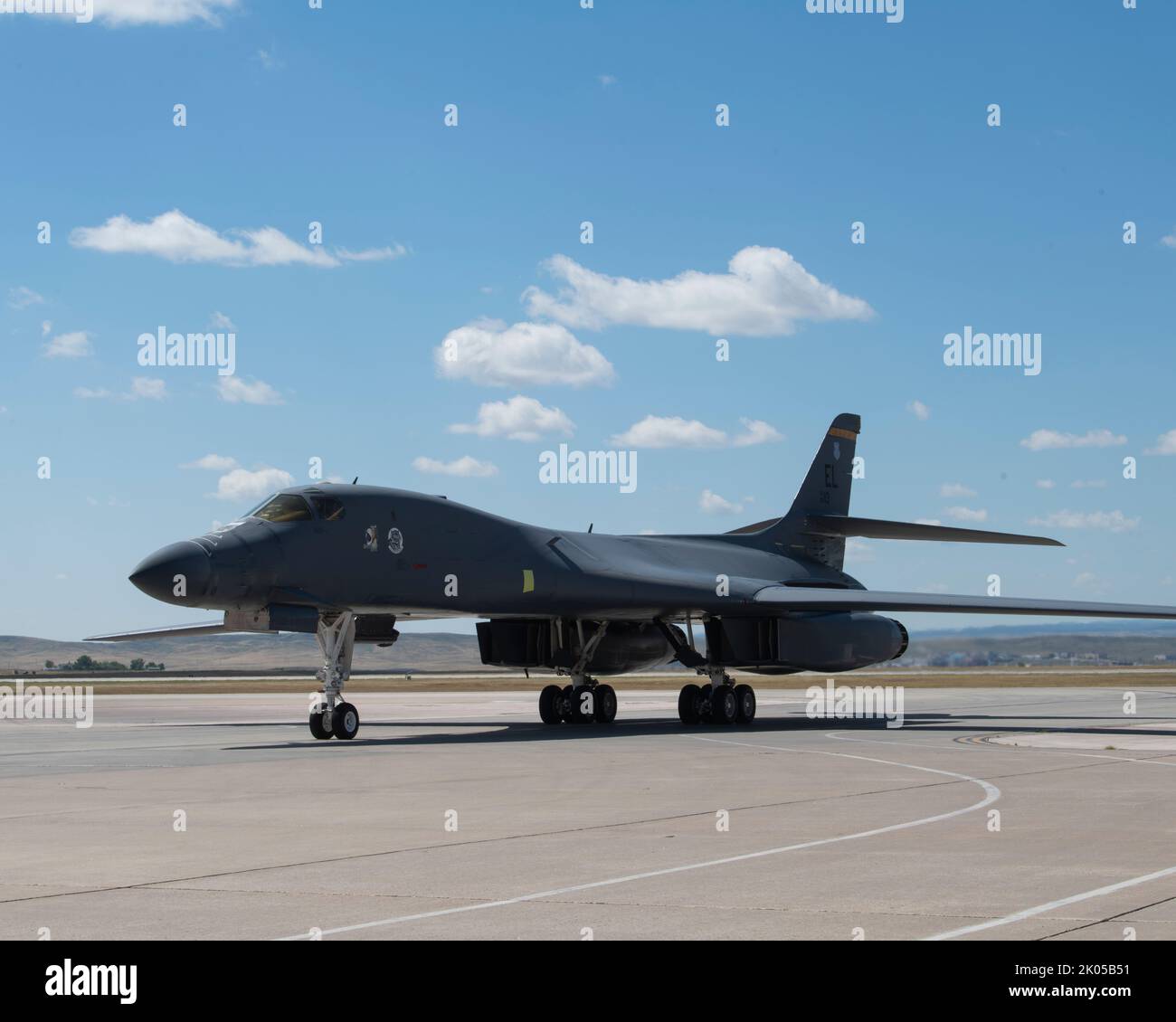 A U.S. Air Force B-1B Lancer, assigned to the 37th Bomb Squadron, taxis ...