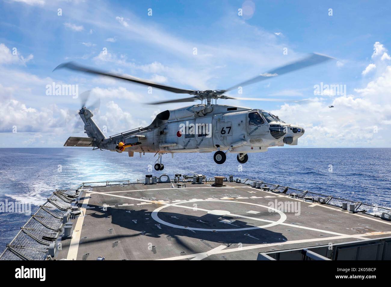 PHILIPPINE SEA (Aug. 31, 2022) An MH-60K helicopter attached to Japan ...