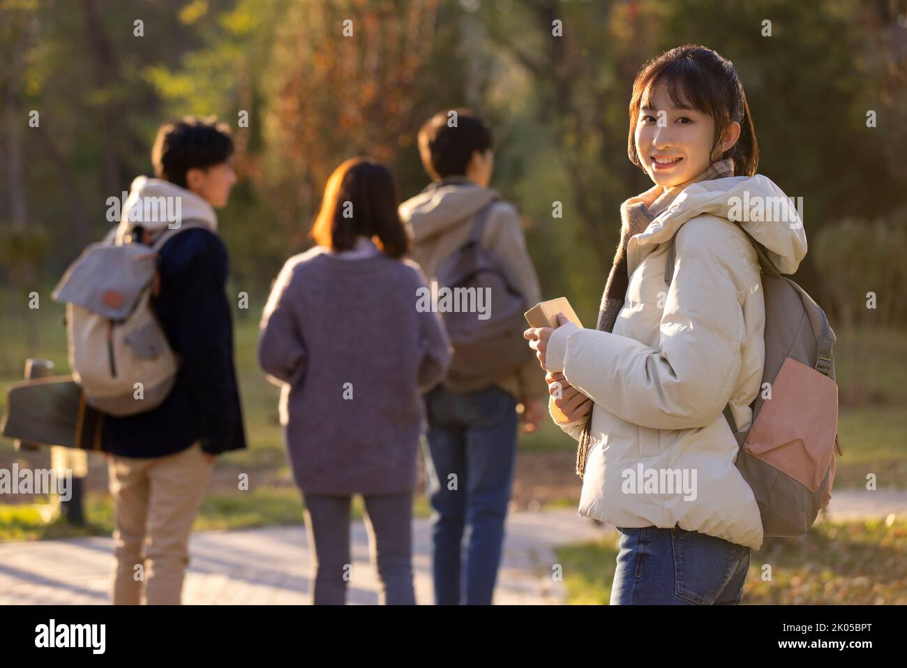 Happy Chinese college students on campus Stock Photo - Alamy