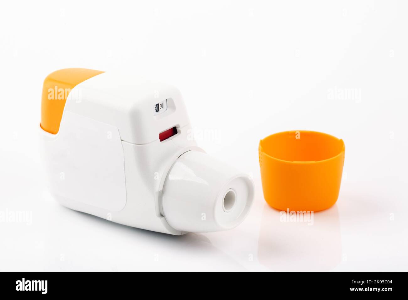 Metered Dose Inhaler isolated over white background Stock Photo - Alamy