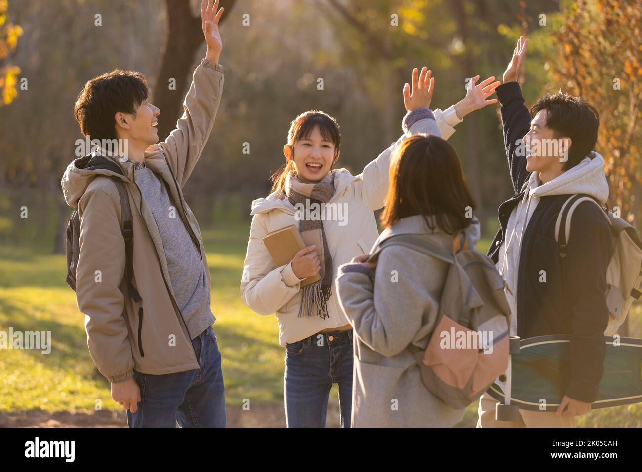 Happy Chinese college students on campus Stock Photo - Alamy