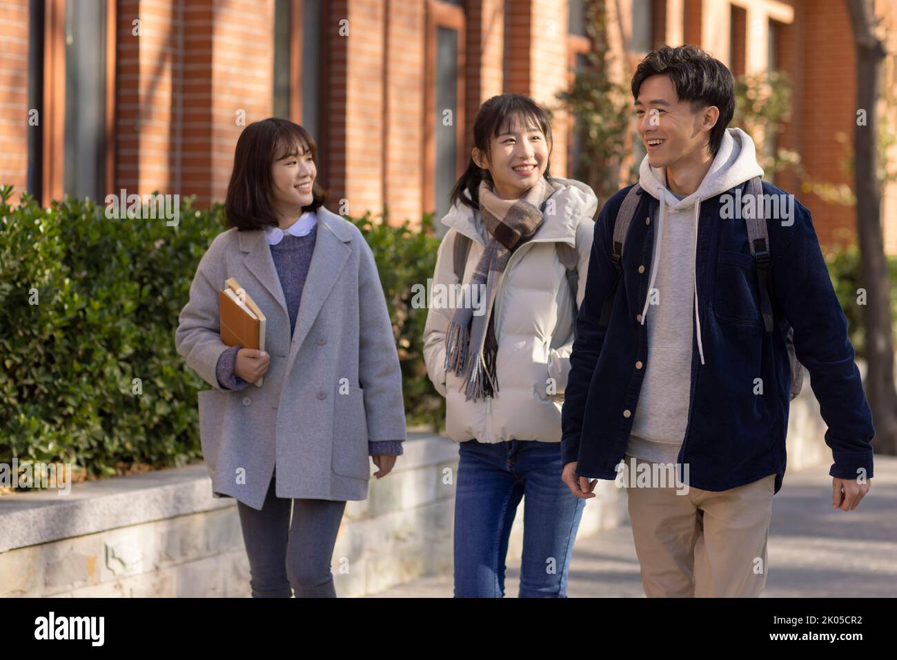 Happy Chinese college students on campus Stock Photo - Alamy