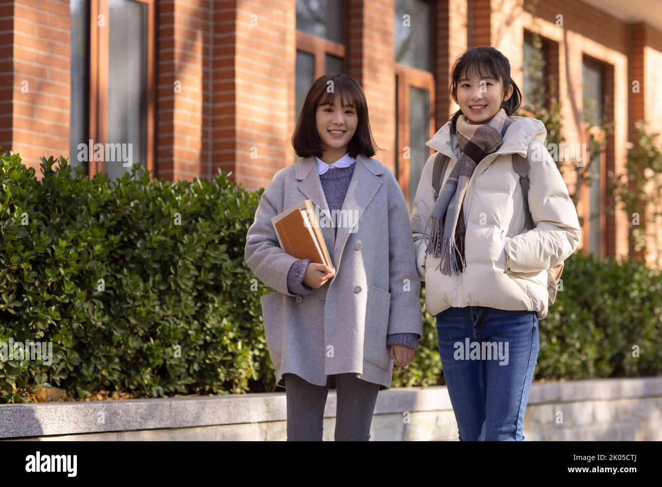 Students pack bag in class hi-res stock photography and images - Alamy