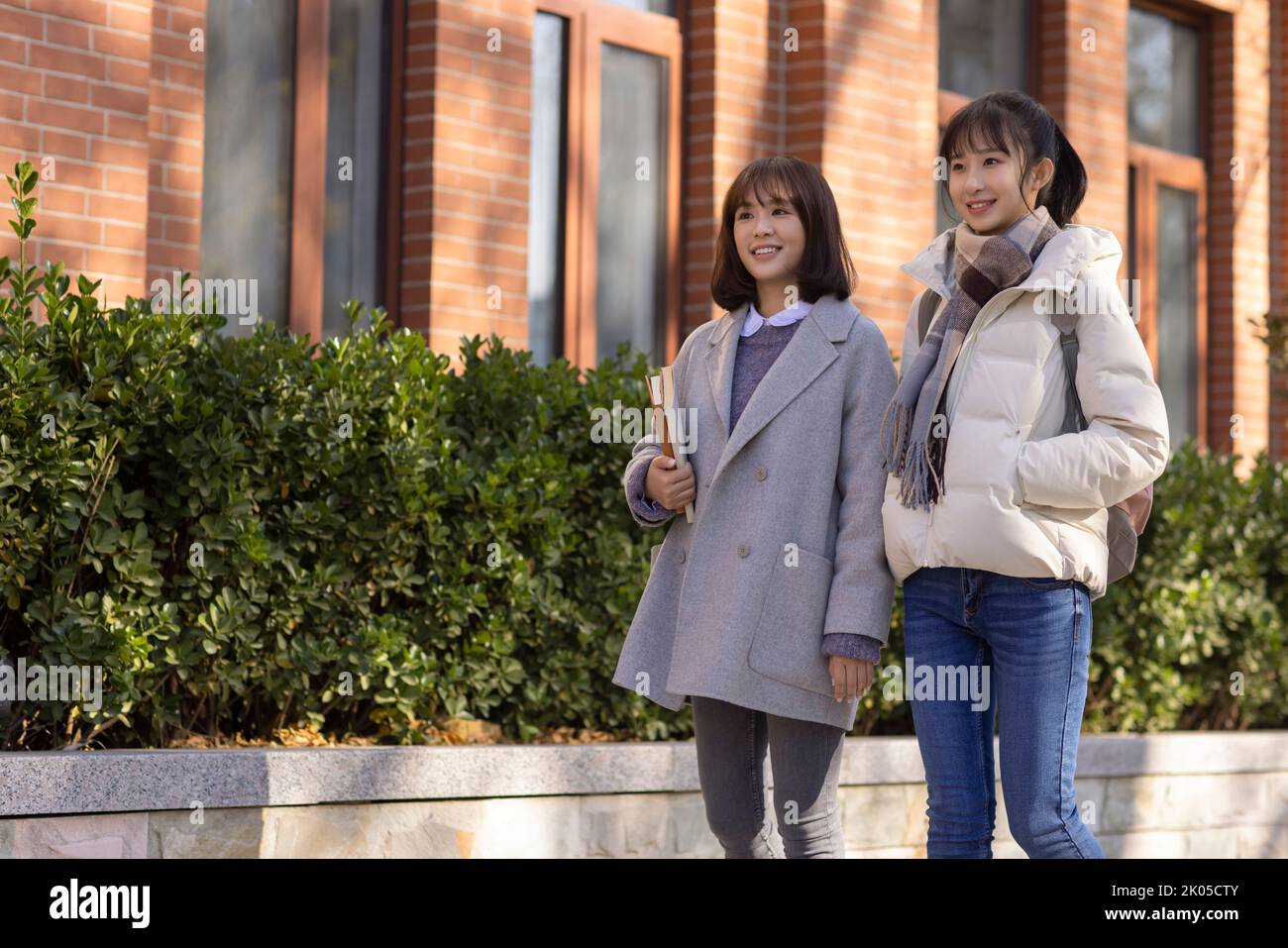 Happy Chinese college students on campus Stock Photo - Alamy