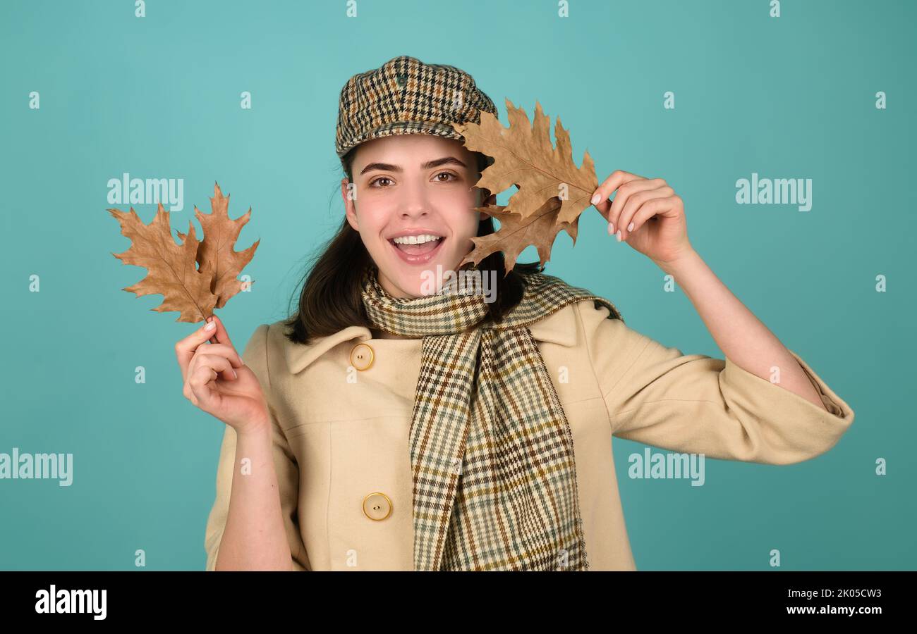 Autumn woman, fall leaves season. Young model with autumn fall leaves ...