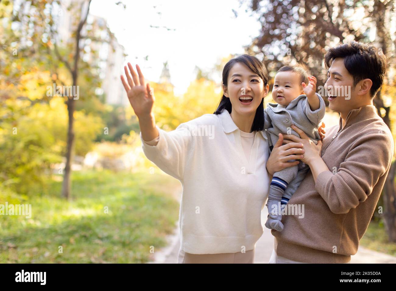 Baby waving hand hi-res stock photography and images - Alamy