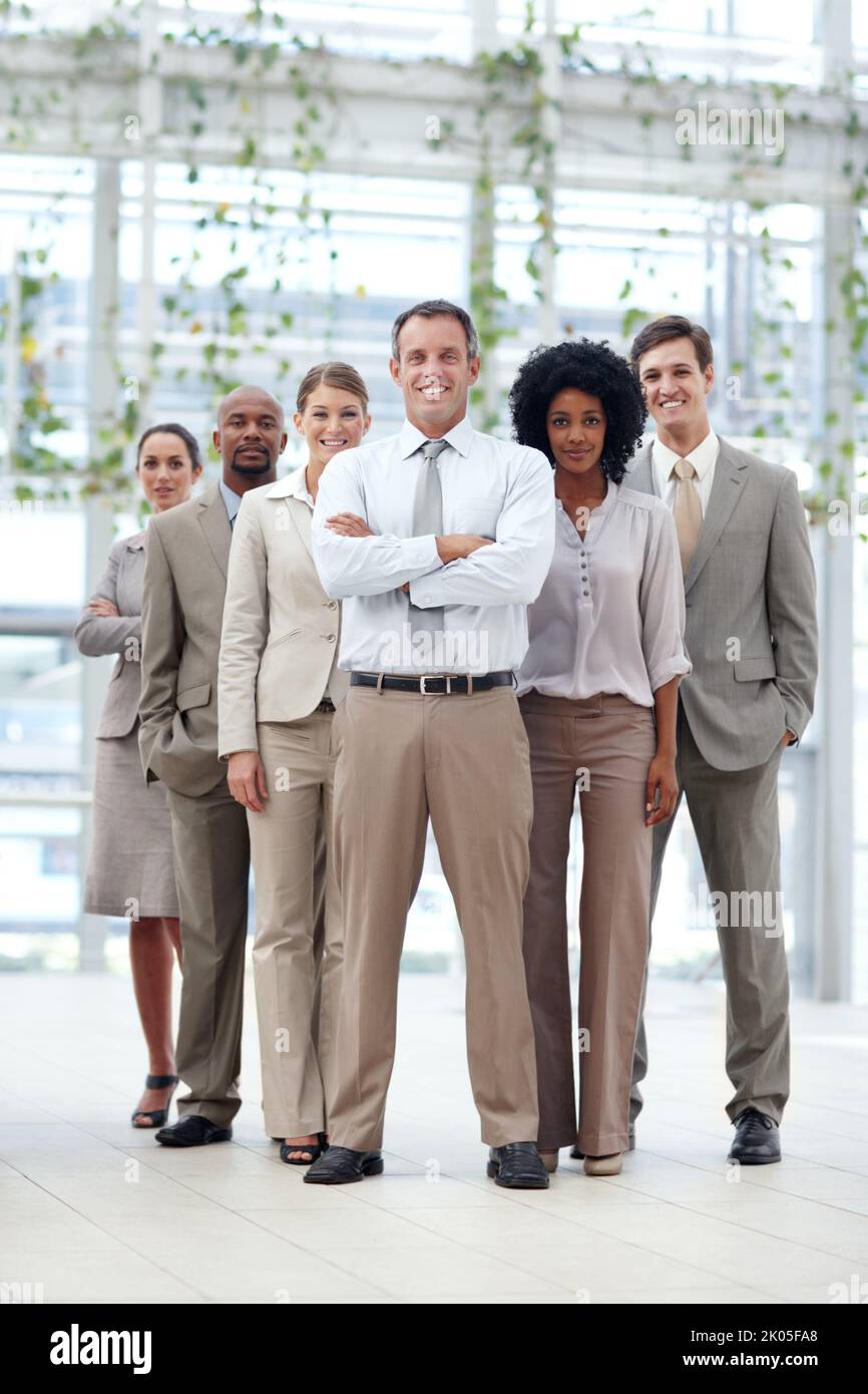 Unstoppable business force. Full length of a dynamic business team ...