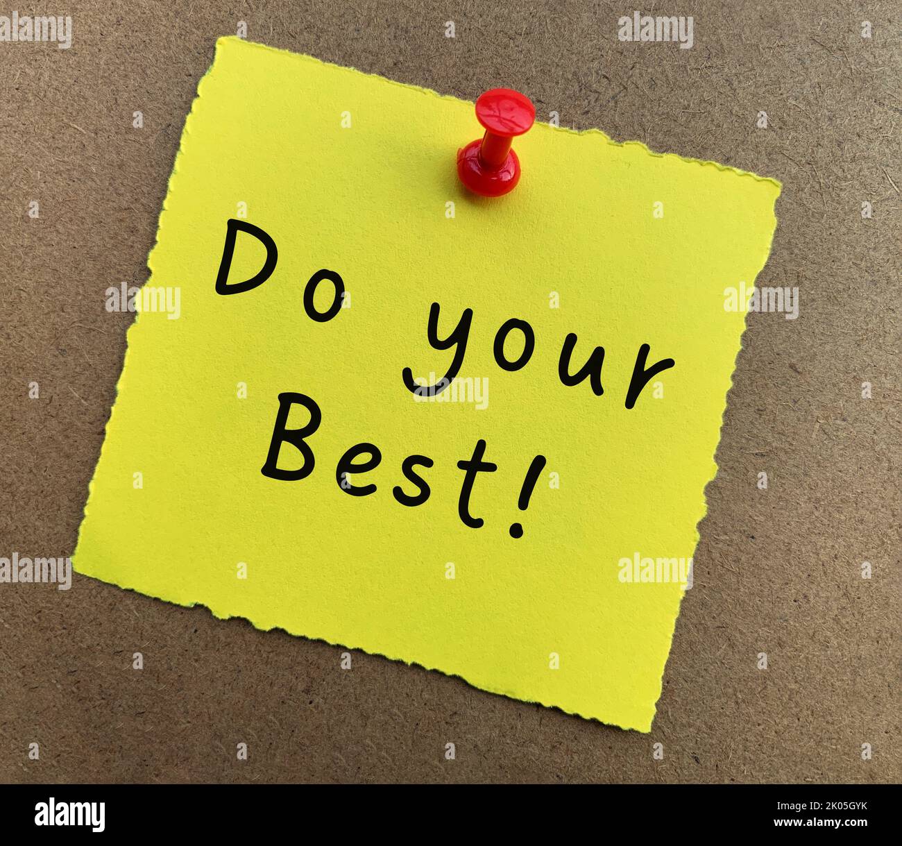 Do your best text on yellow notepad with wooden background ...