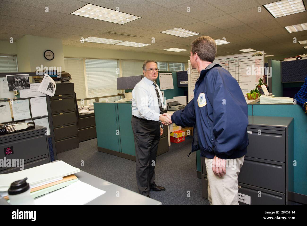 Secretary Shaun Donovan greeting HUD employees and thanking them for ...