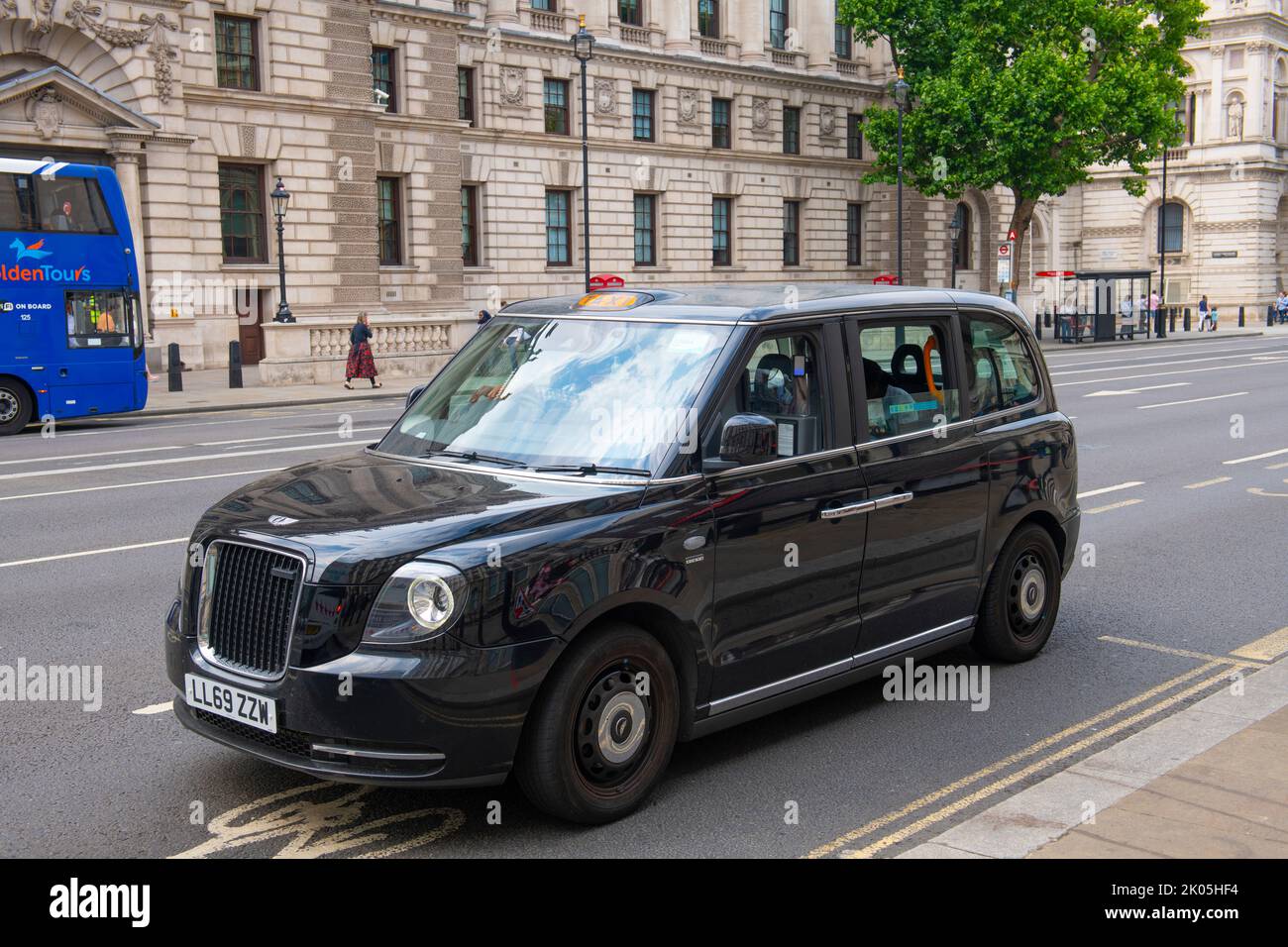 Hackney carriage antique black taxi cab on Parliament Street in city of ...