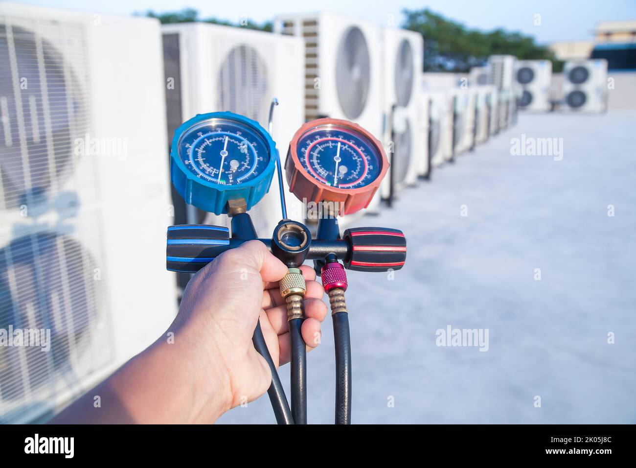 air conditioner check service, leak detection, fill refrigerant Stock Photo - Alamy