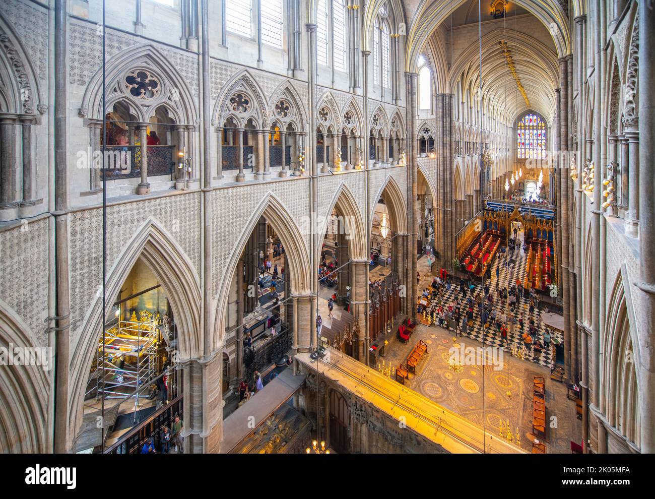 Nave of Westminster Abbey with Gothic style. The church is located next ...