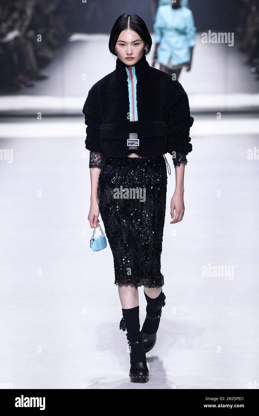 Model He Cong walks on the runway at the Fendi Resort fashion show ...