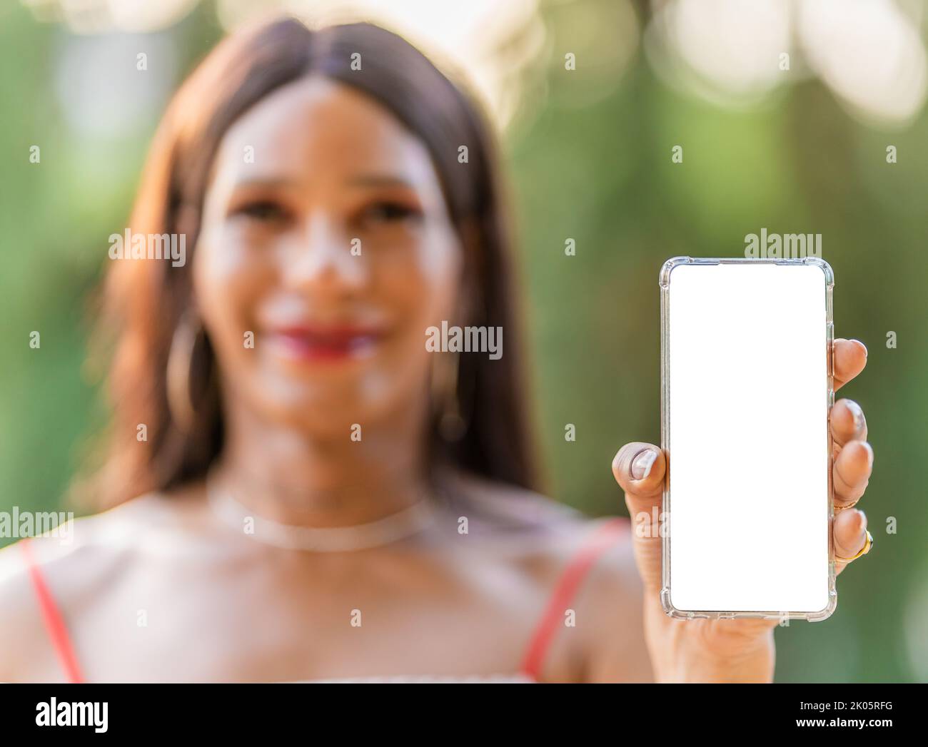 Focus on the screen of a mobile in a hand Stock Photo - Alamy