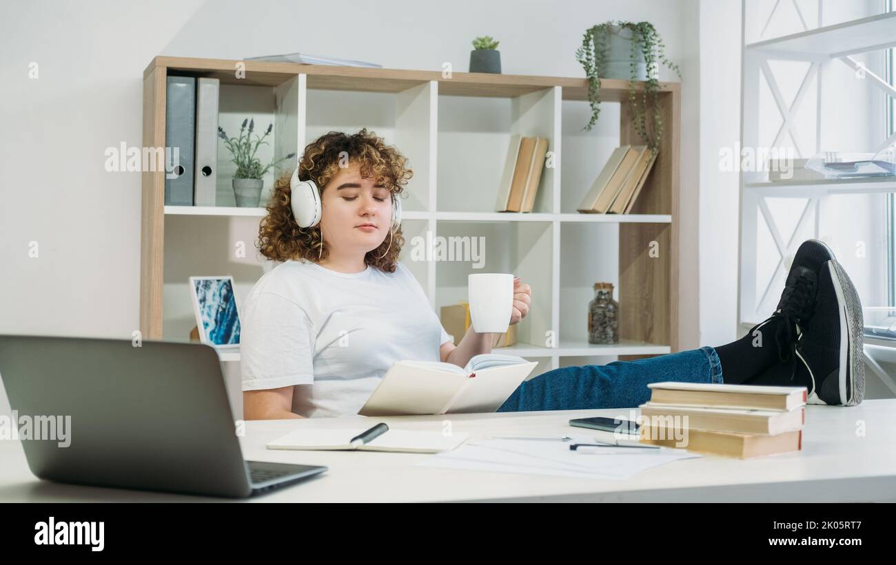 cozy leisure lazy day reading woman indoors book Stock Photo - Alamy