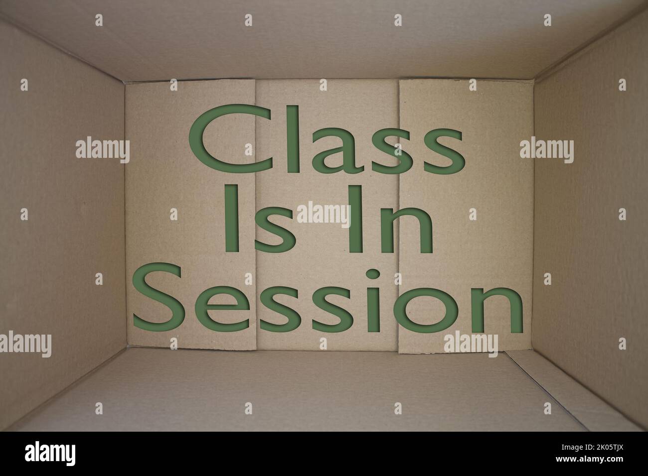 Class Is In Session word with cardboard box. Brown folded card box ...